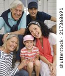 Young Family Sitting Free Stock Photo - Public Domain Pictures